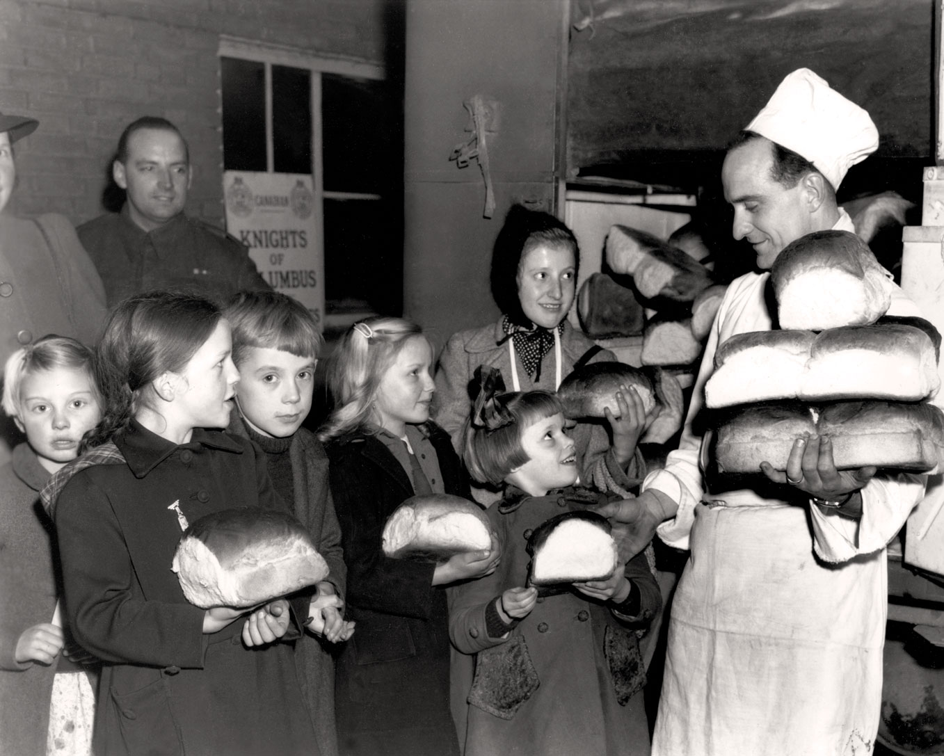 Historic WWII Photo – Delivering Bread - Legion Magazine